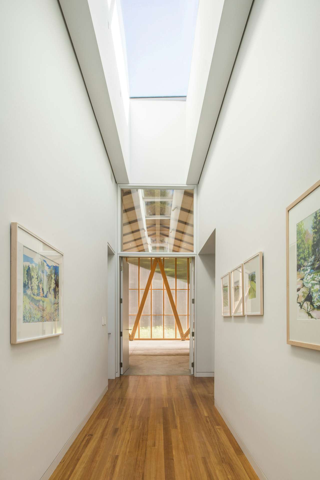 A Home Designed for a Couple Aging in Place Features Walls of Windows ...