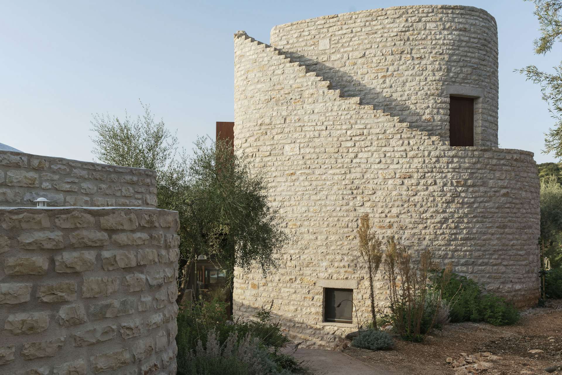 A Cluster of Earthy, Stone-Built Huts Form a Far-Out Retreat in Greece ...