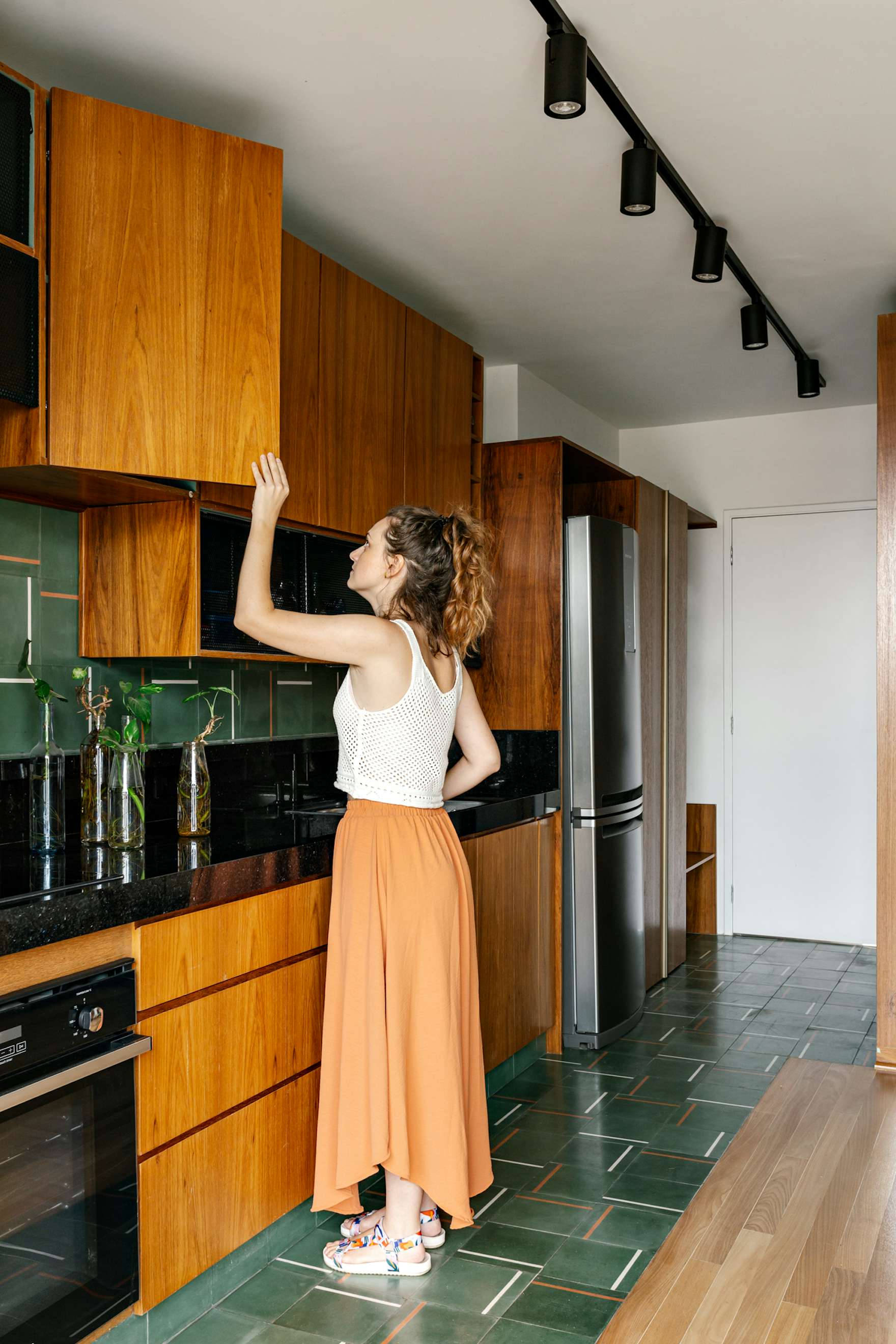 The Mirror in This Tiny Brazil Apartment Hides an Entire Work-From-Home ...